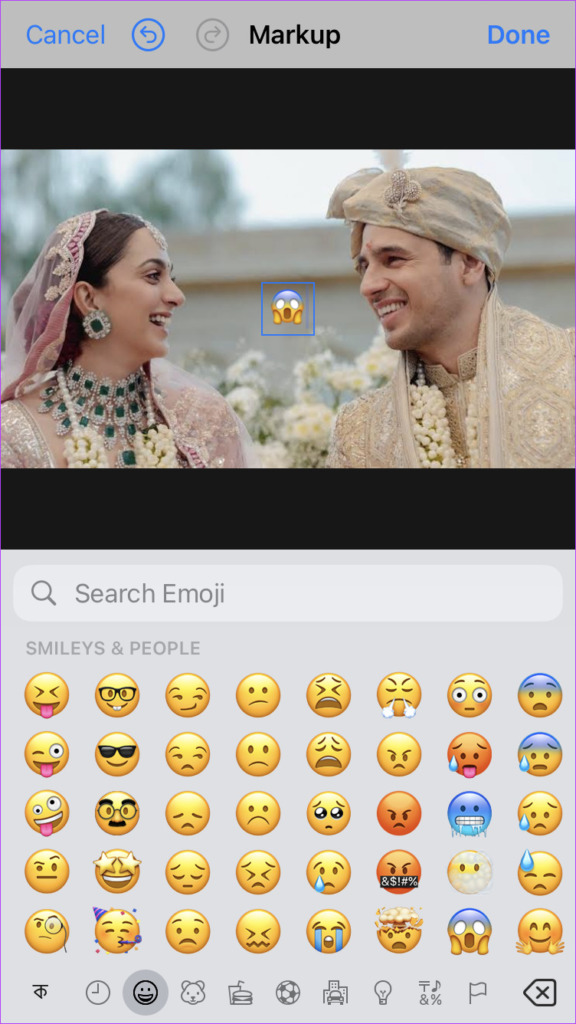 4 Easy Ways to Put an Emoji on a Picture on iPhone - Guiding Tech